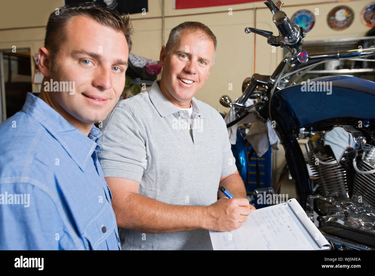 Two mechanics at work Stock Photo - Alamy