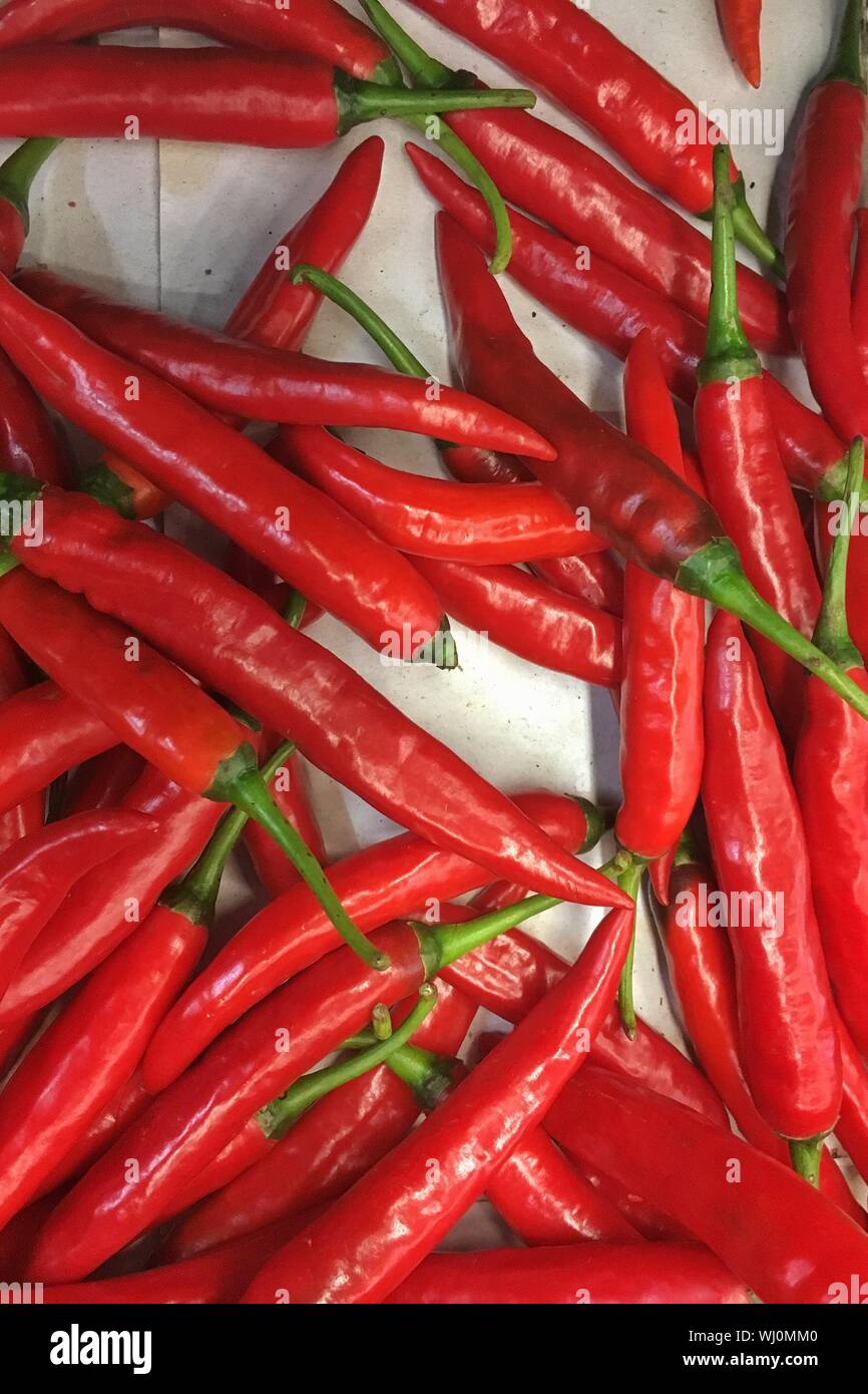 Group of shiny red peppers hi-res stock photography and images - Alamy