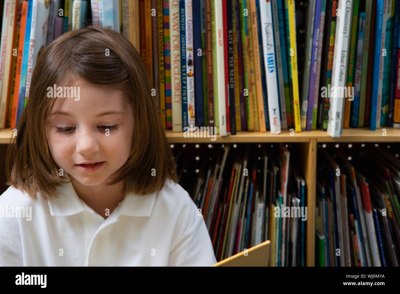 Little Girl Reading Stock Photo - Alamy