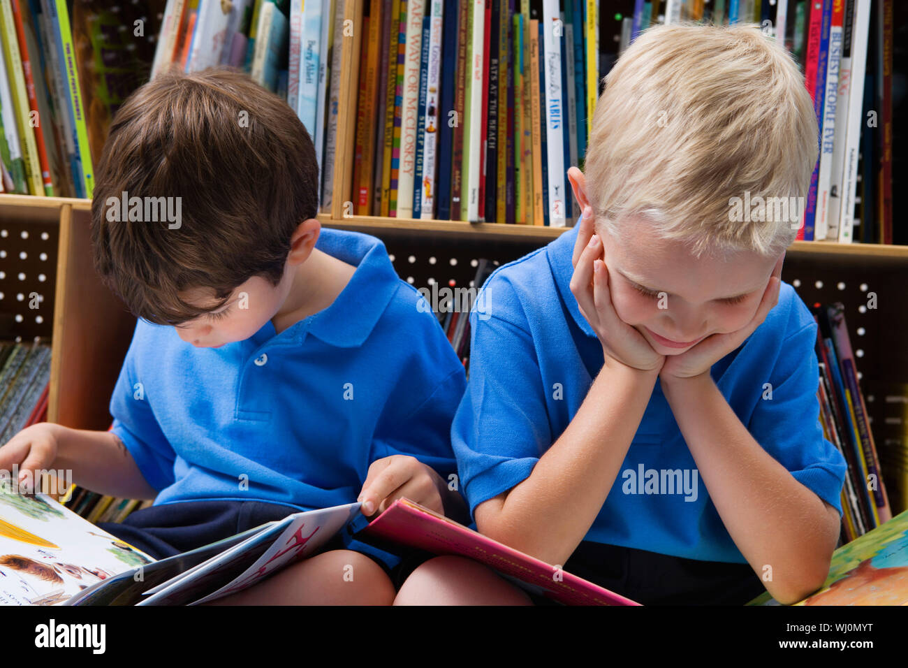 Little Boys Reading Picture Books Stock Photo - Alamy