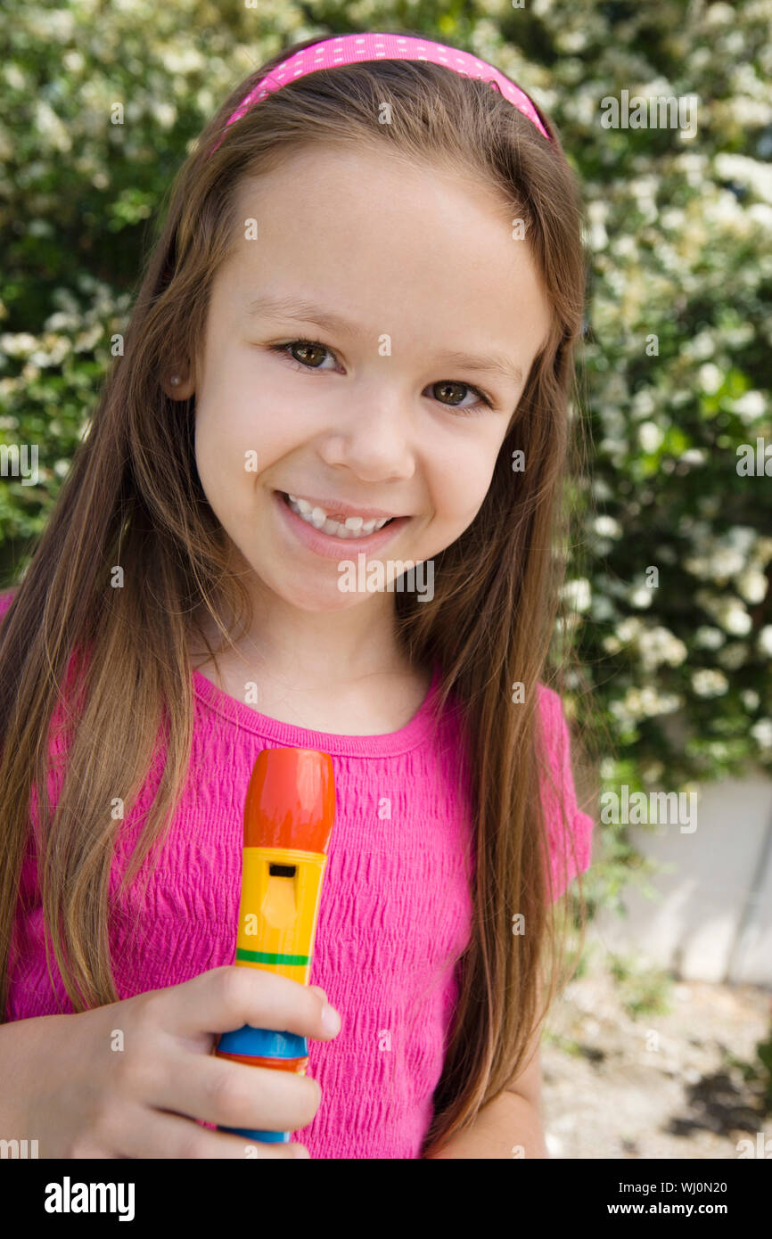Little Girl with a Recorder Stock Photo - Alamy