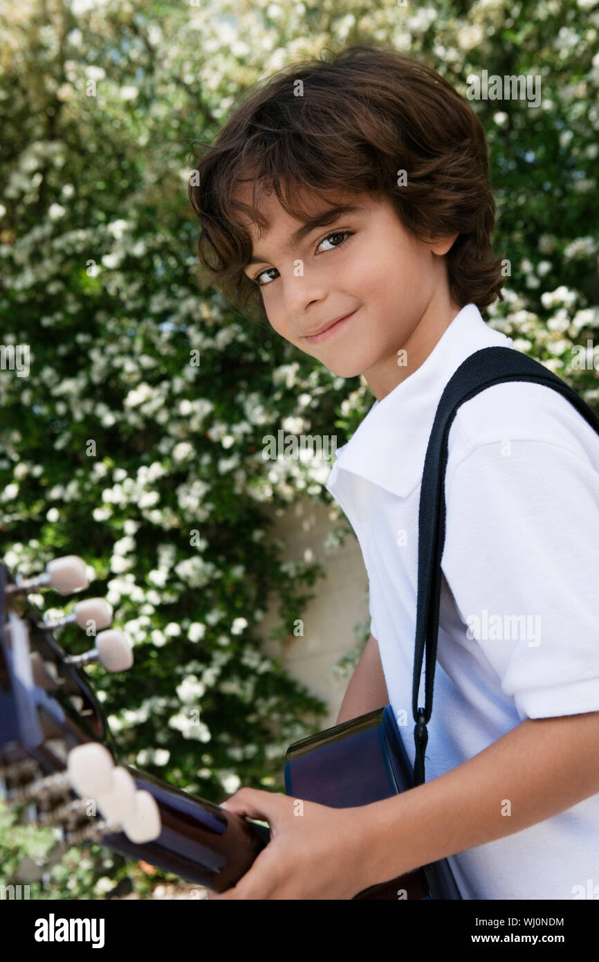 Little Boy Playing Guitar Stock Photo - Alamy
