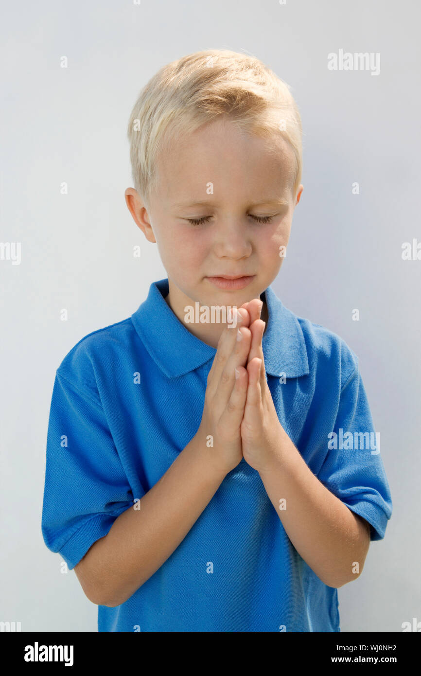 Young Boy Praying Stock Photo - Alamy