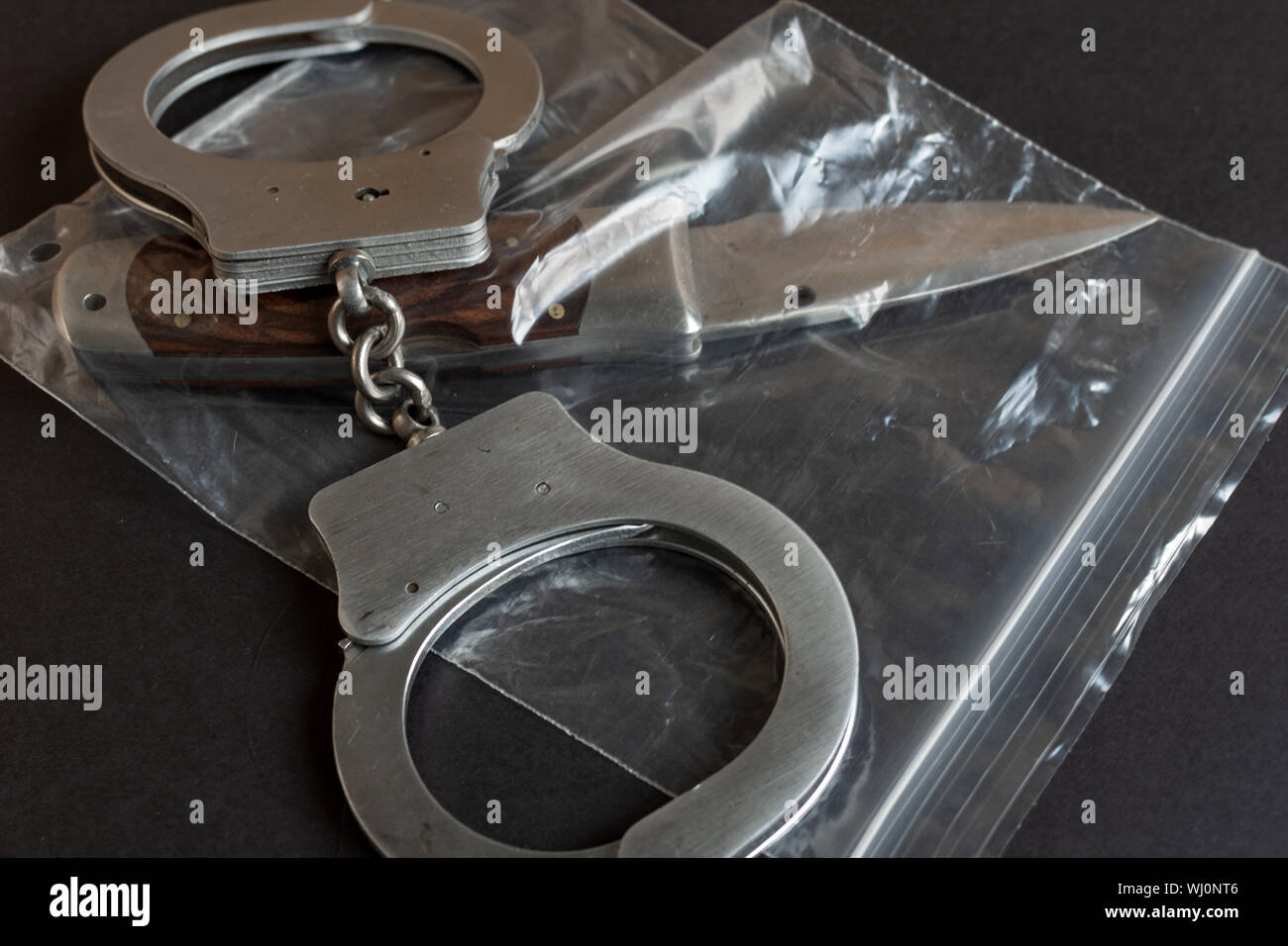 Plastic handcuffs hi-res stock photography and images - Alamy