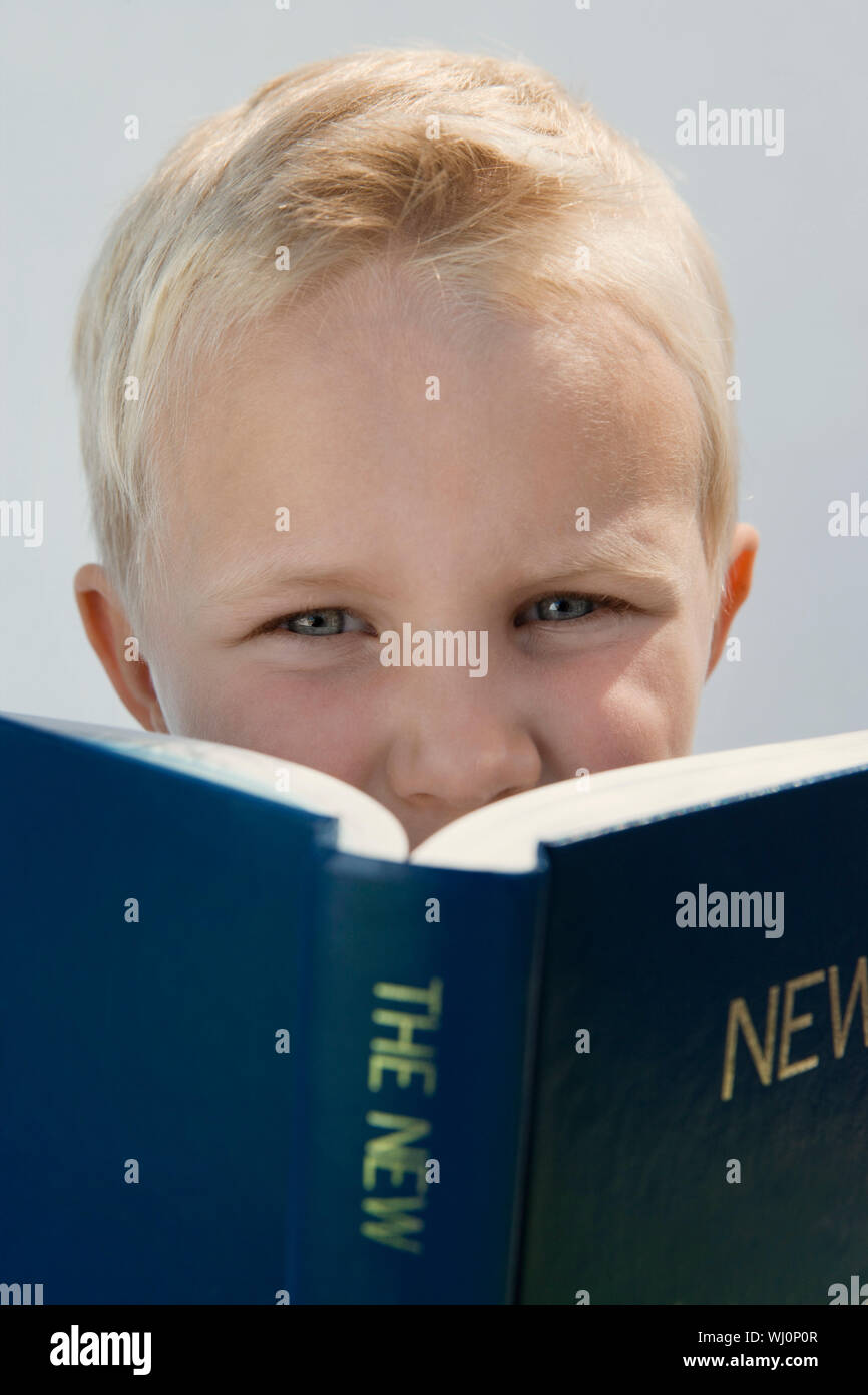 Boy Reading The New Testament Stock Photo - Alamy