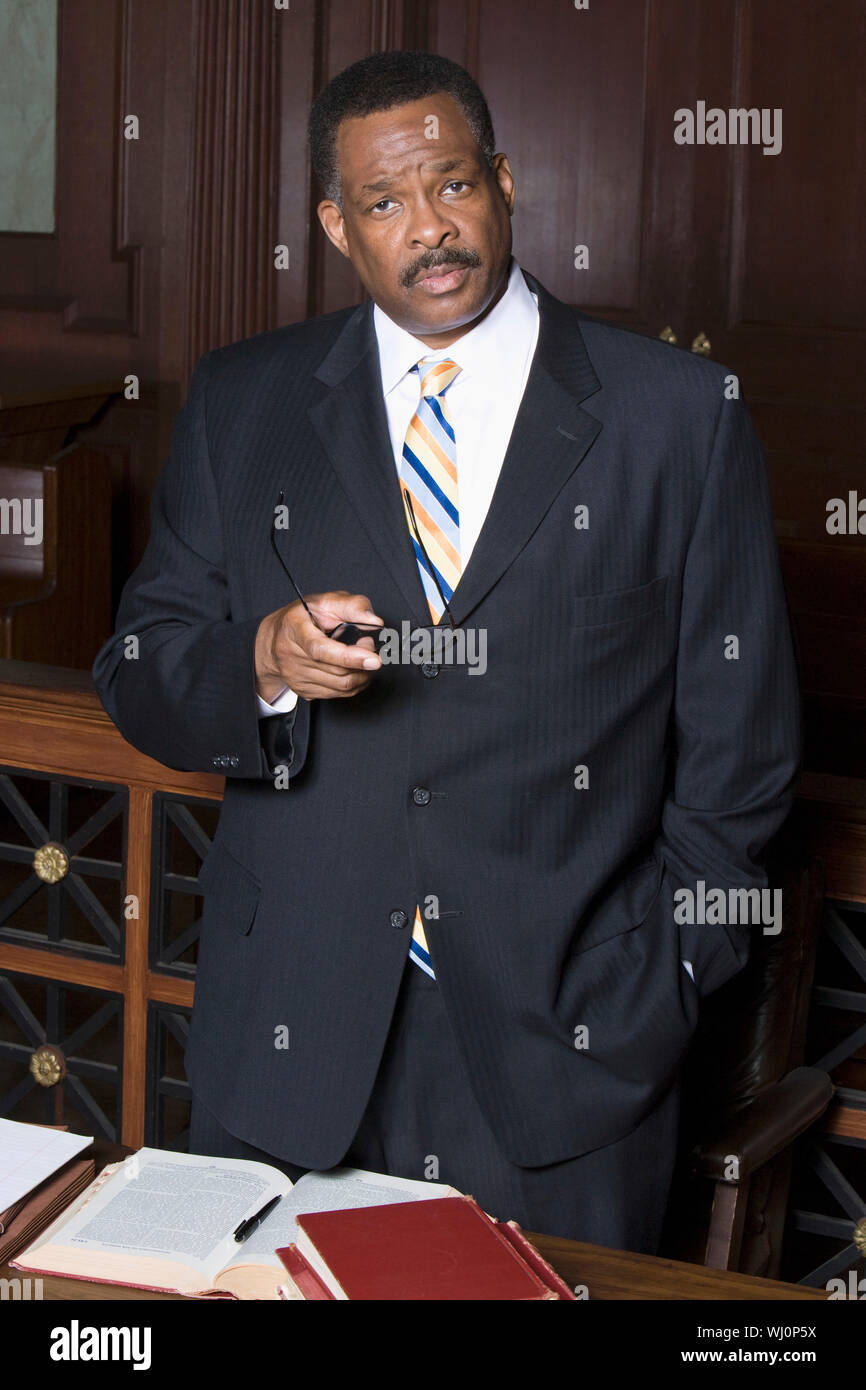 Man standing in court, portrait Stock Photo - Alamy