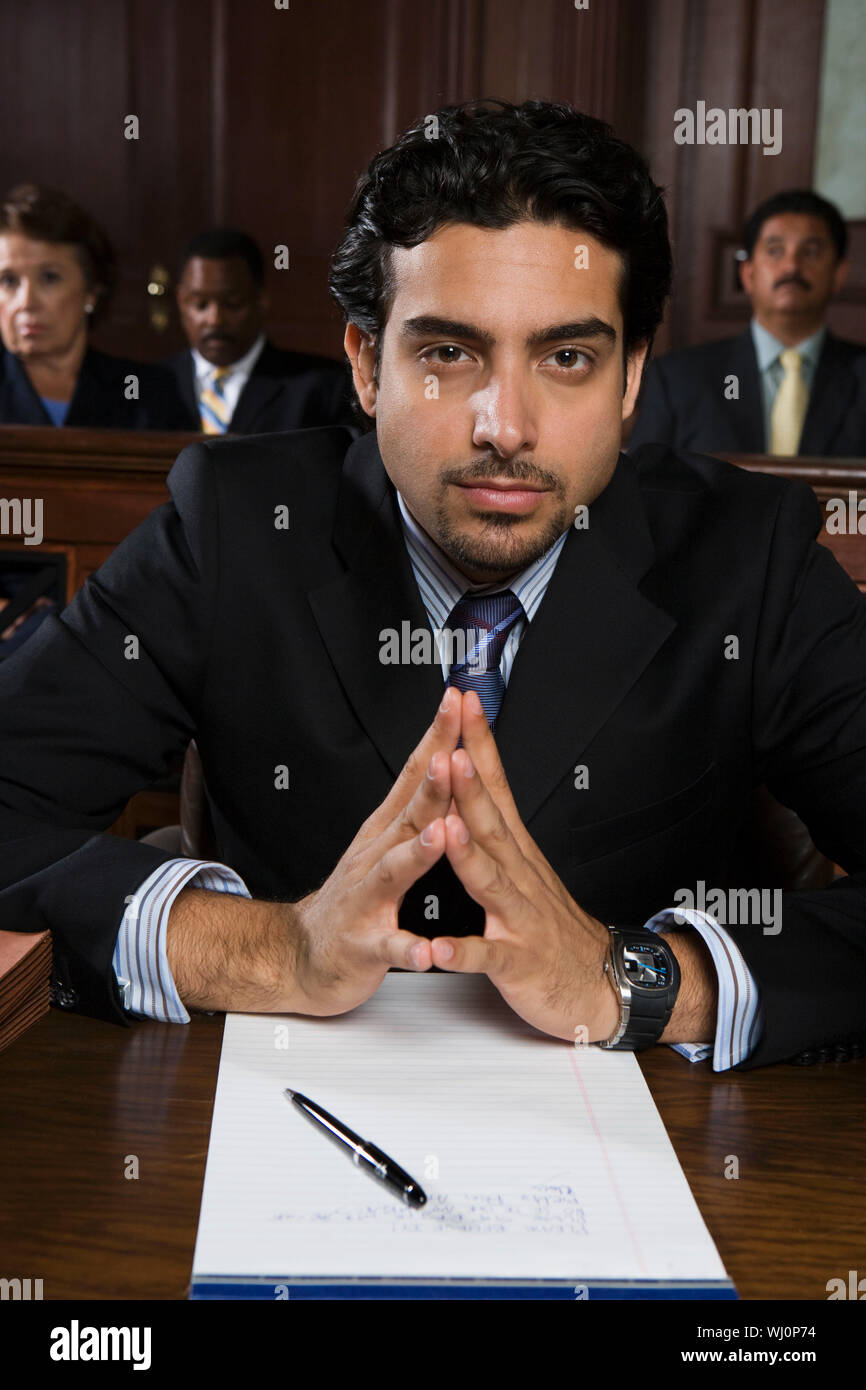 Man sitting in court, portrait Stock Photo - Alamy