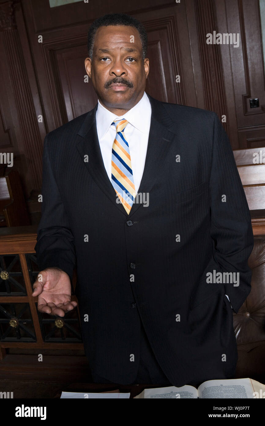 Man standing in court, portrait Stock Photo - Alamy