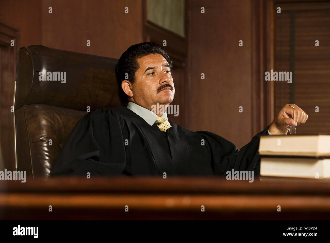 Judge sitting in court Stock Photo - Alamy