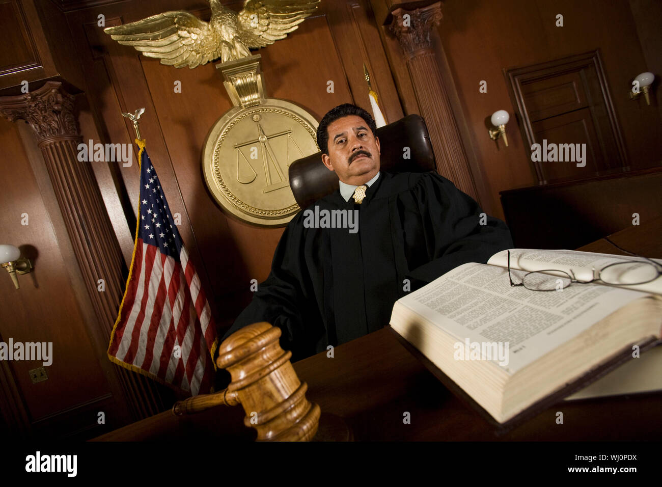 Judge sitting in court Stock Photo - Alamy