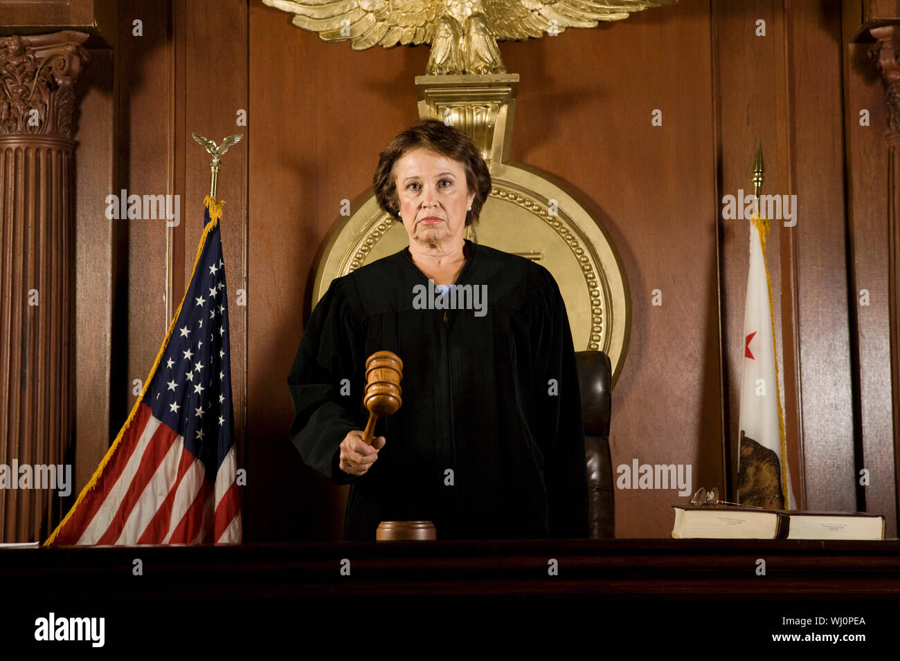 Judge forming a judgement in a courtroom Stock Photo - Alamy
