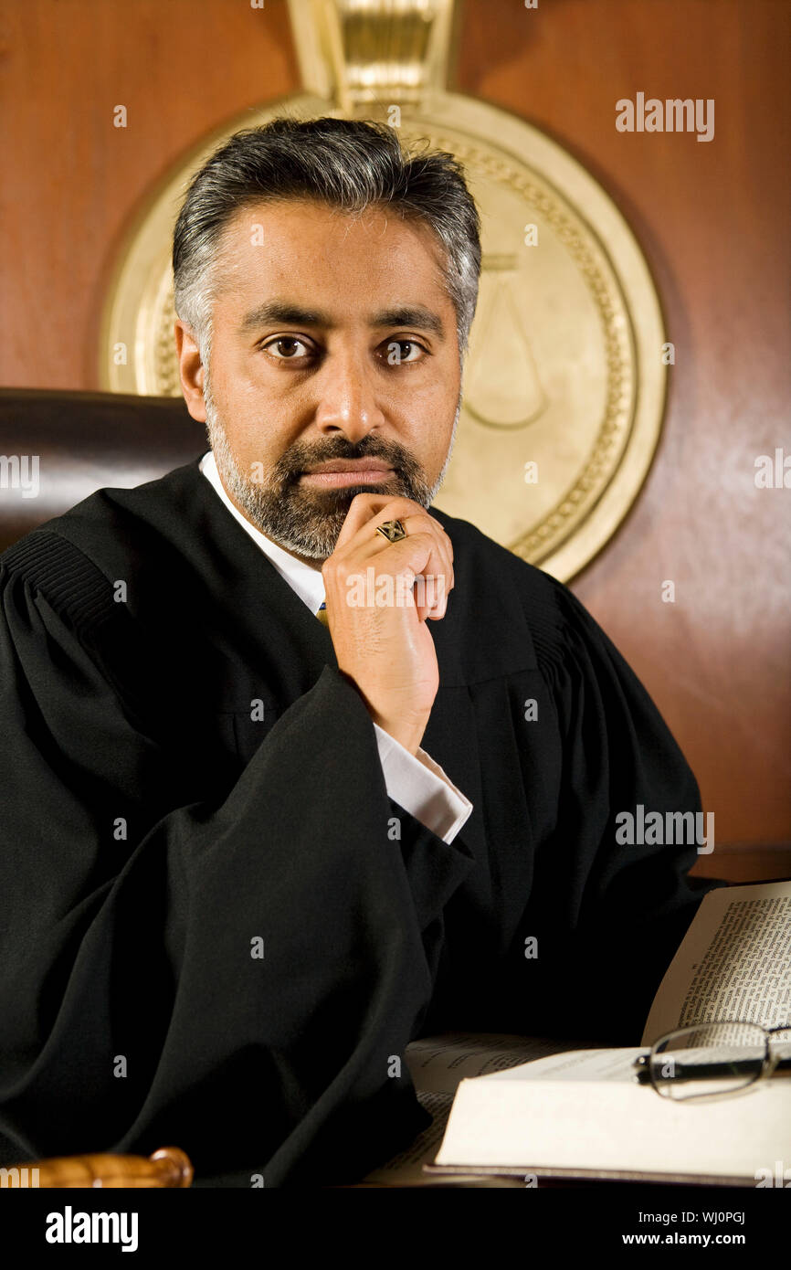 Middle-aged judge in a courtroom Stock Photo - Alamy