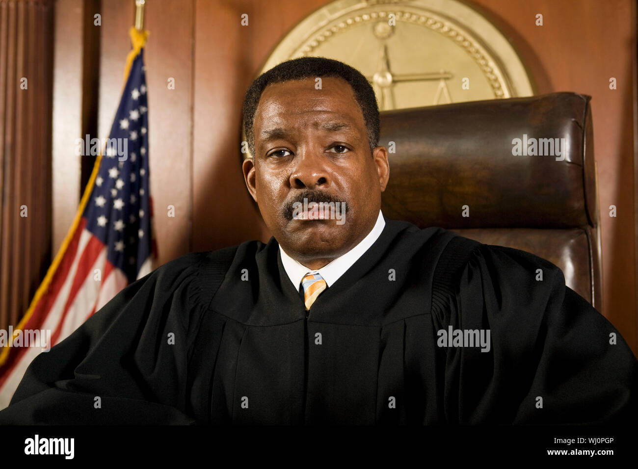Middle-aged judge in a courtroom Stock Photo - Alamy