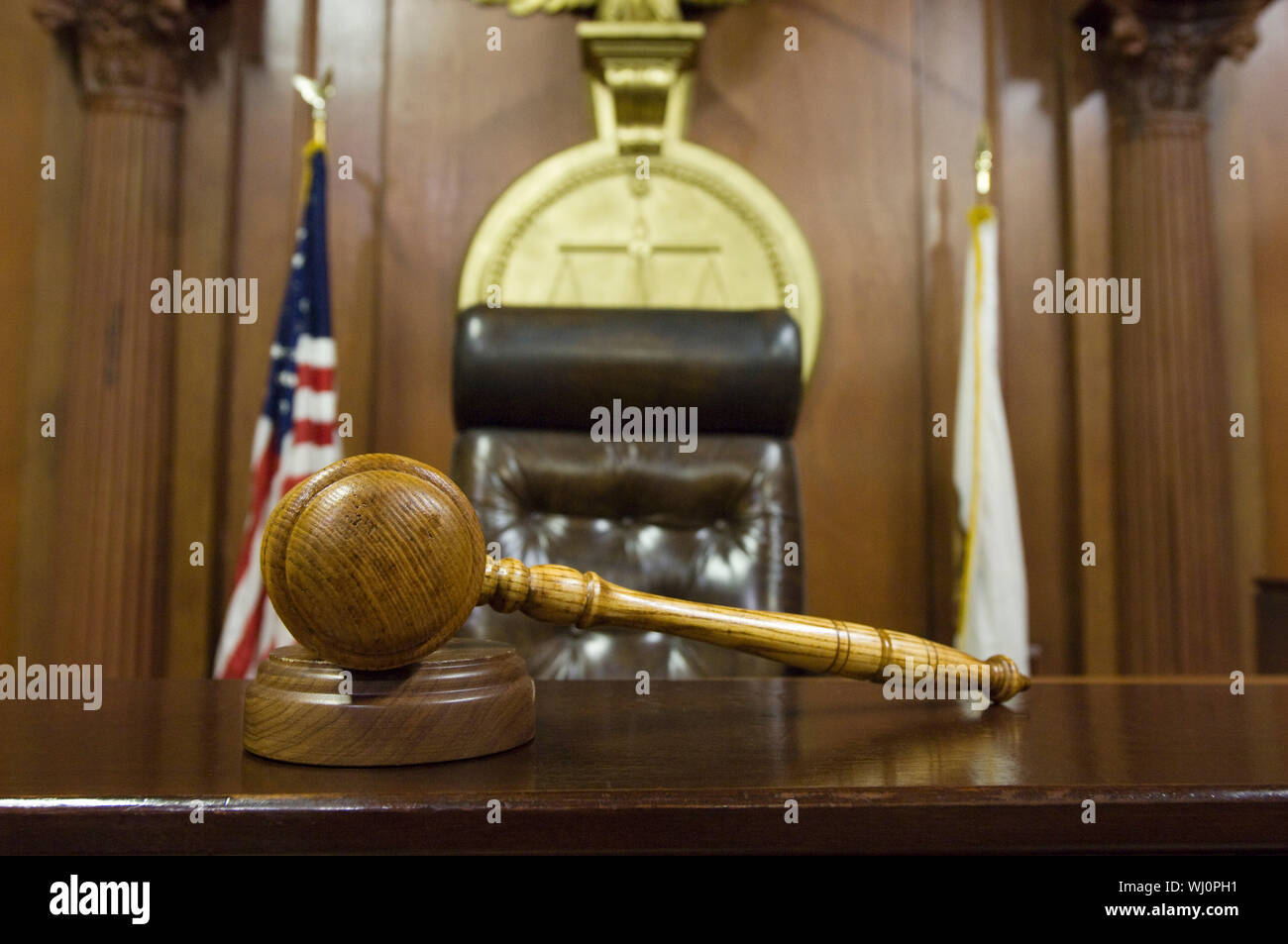 Hammer and gavel near judges chair in court Stock Photo - Alamy