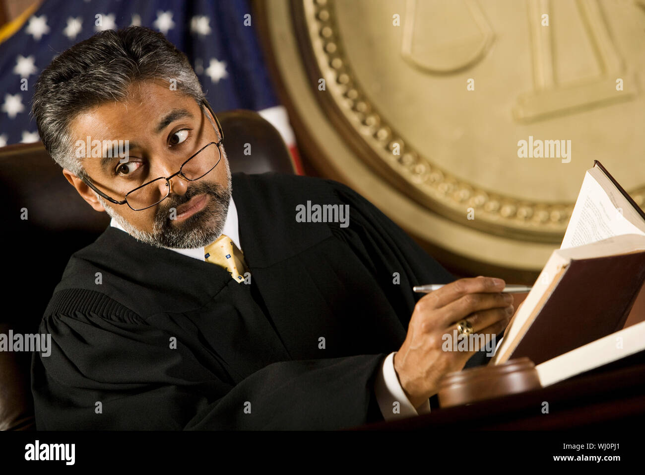 Middle-aged judge in a courtroom Stock Photo - Alamy