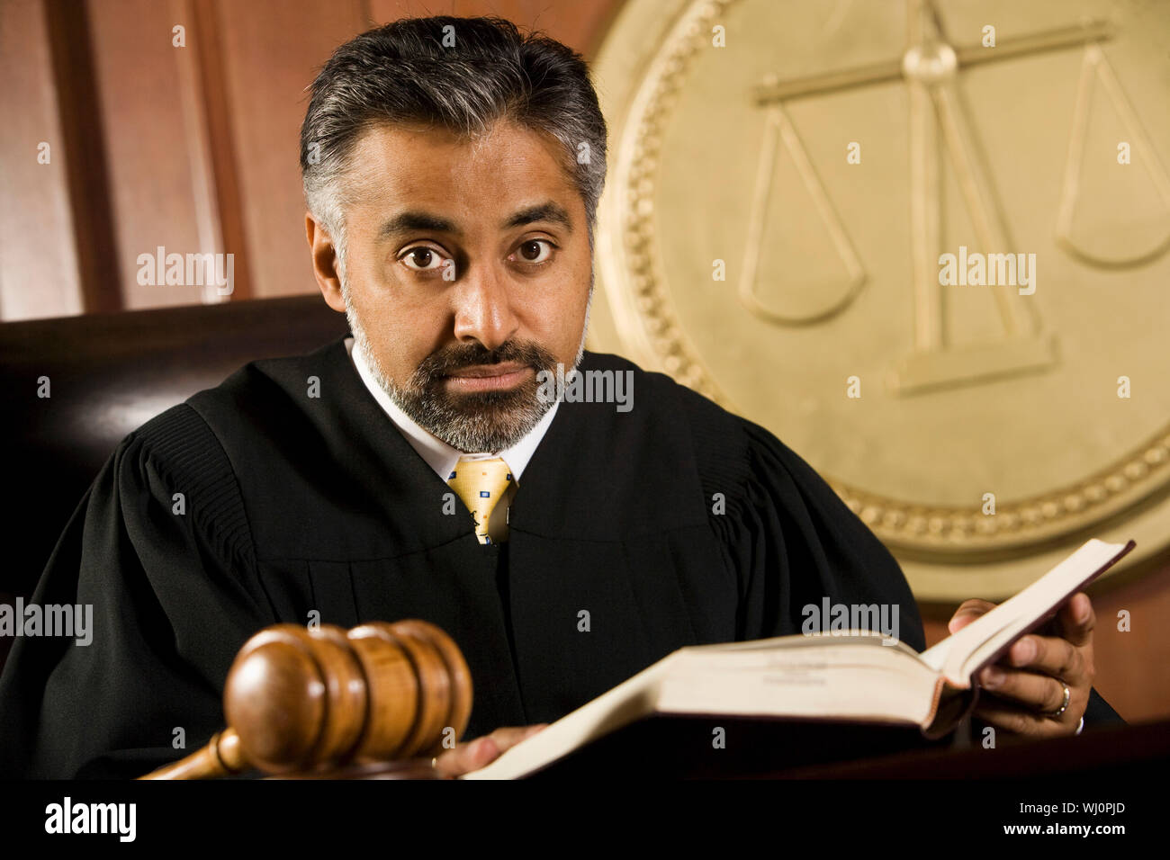Middle-aged judge in a courtroom Stock Photo - Alamy