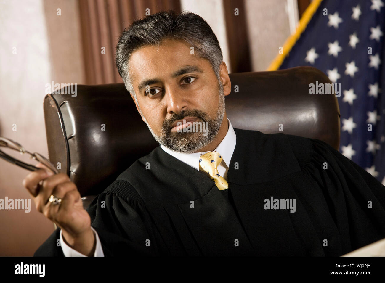 Middle-aged judge in a courtroom Stock Photo - Alamy