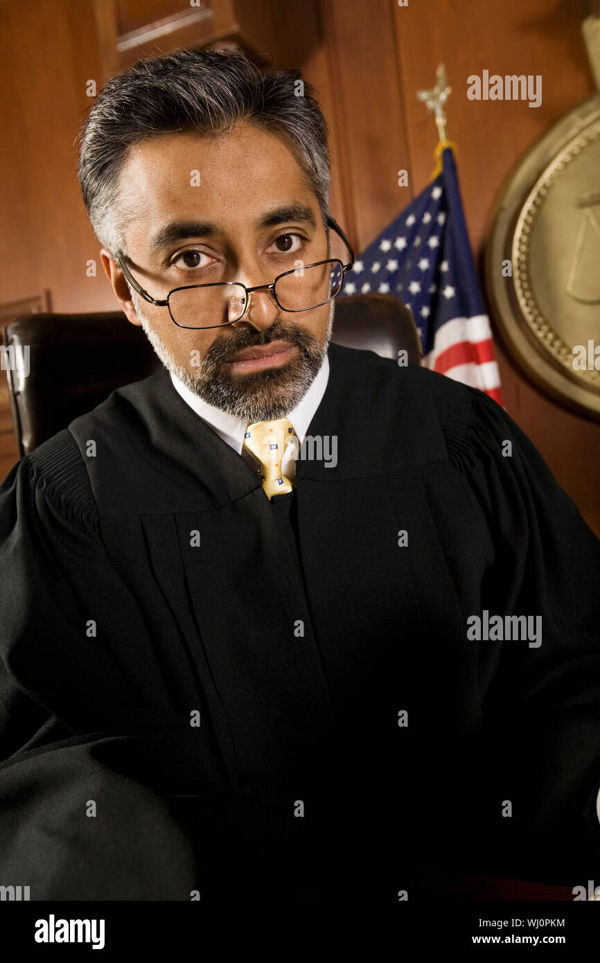 Male judge sitting in court, portrait Stock Photo - Alamy