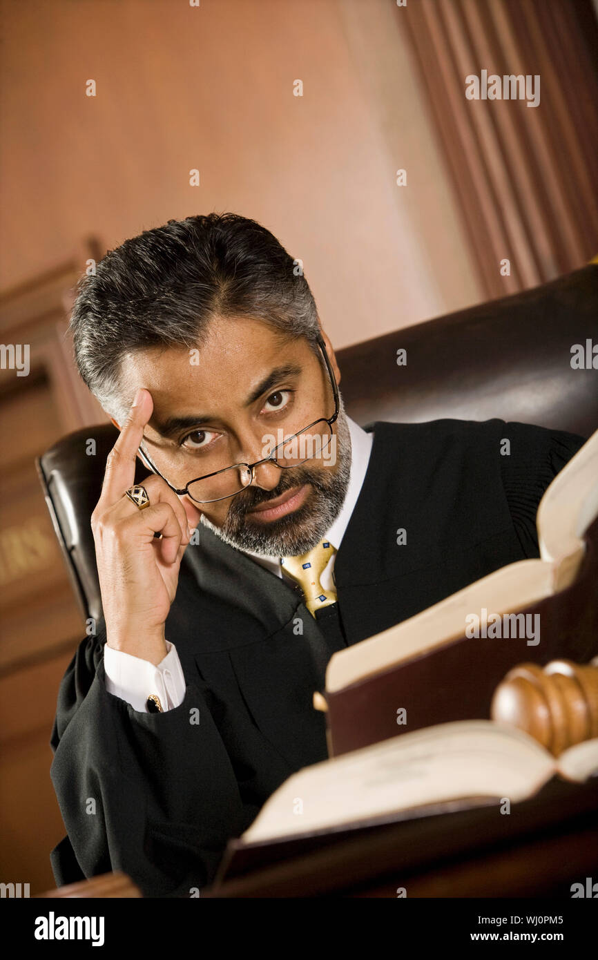 Middle-aged judge in a courtroom Stock Photo - Alamy