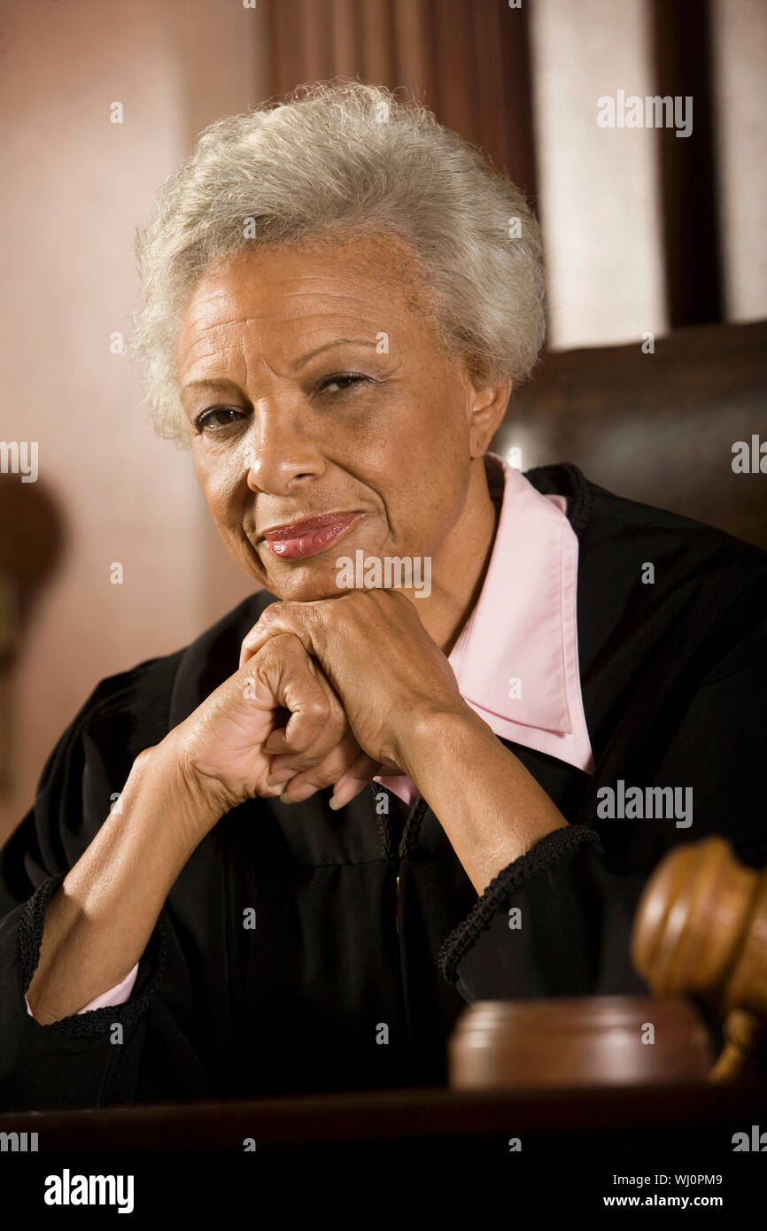 Female judge sitting in court, portrait Stock Photo - Alamy