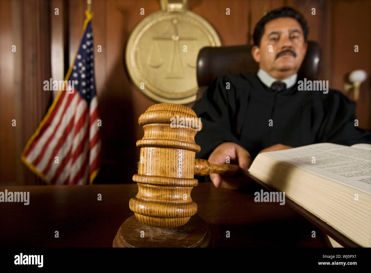 Judge gavel gown hand hi-res stock photography and images - Alamy