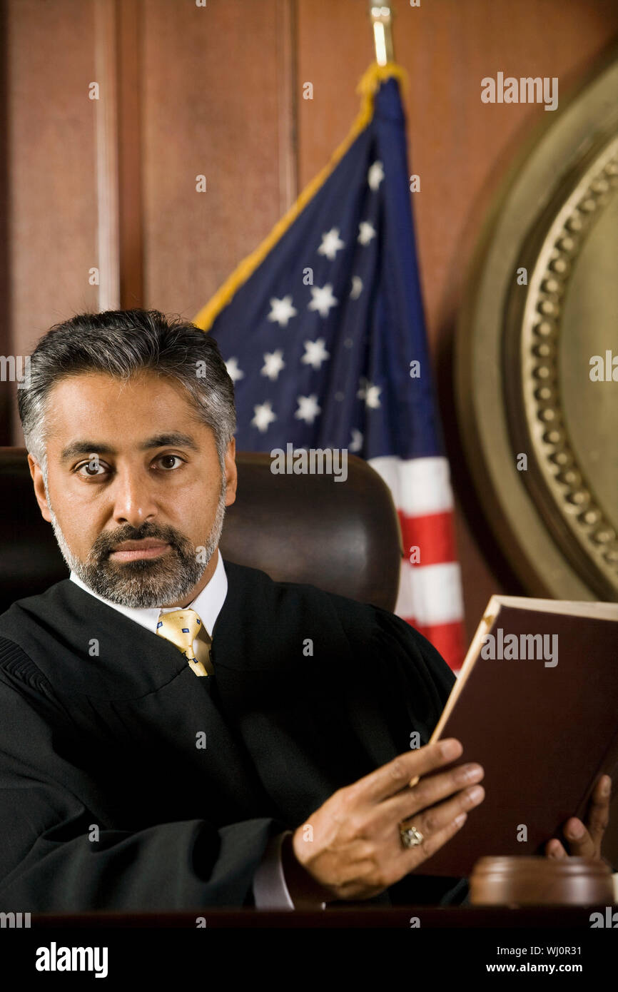 Middle-aged judge in a courtroom Stock Photo - Alamy