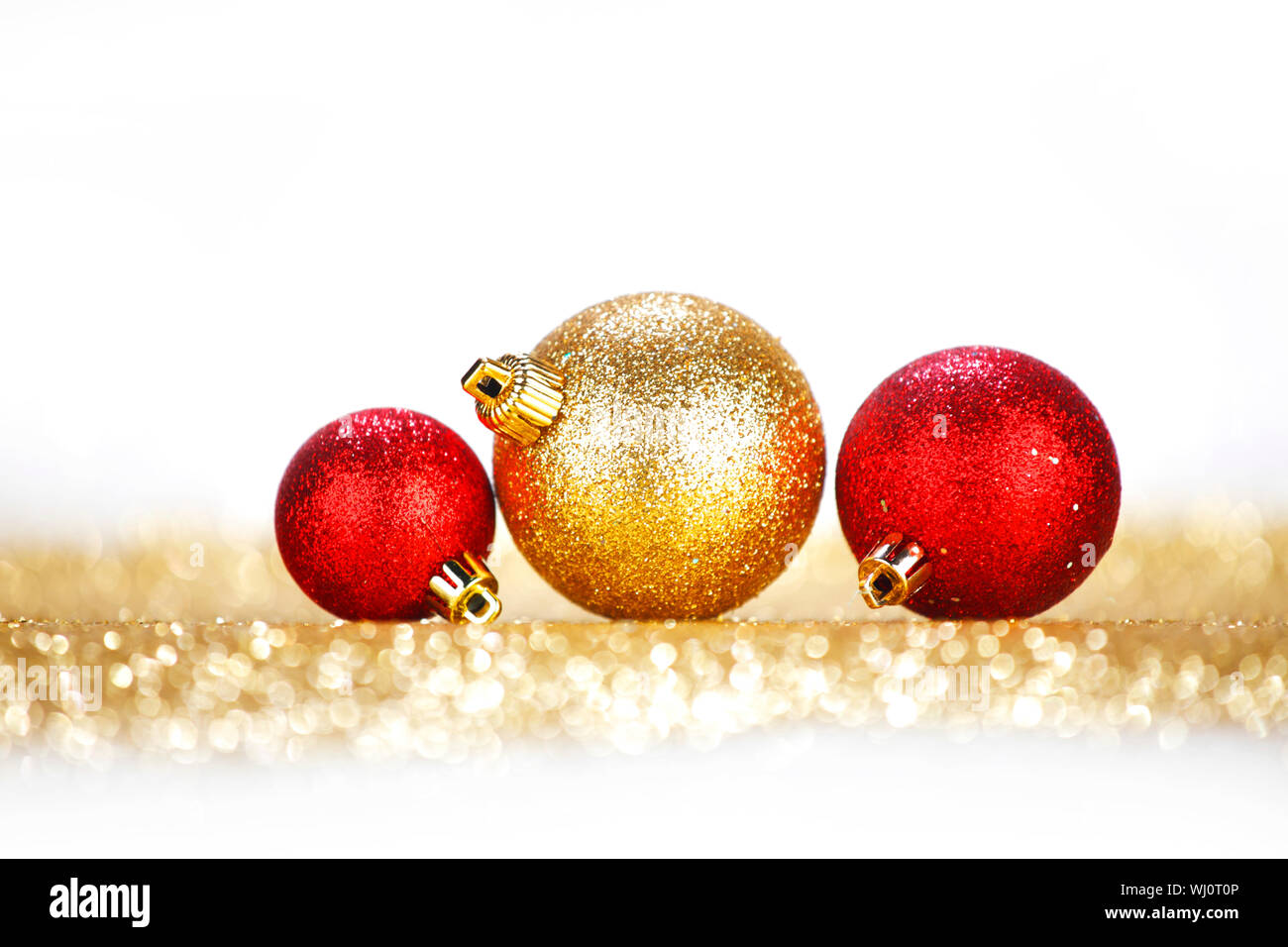 Colorful christmas balls on glitter background Stock Photo - Alamy