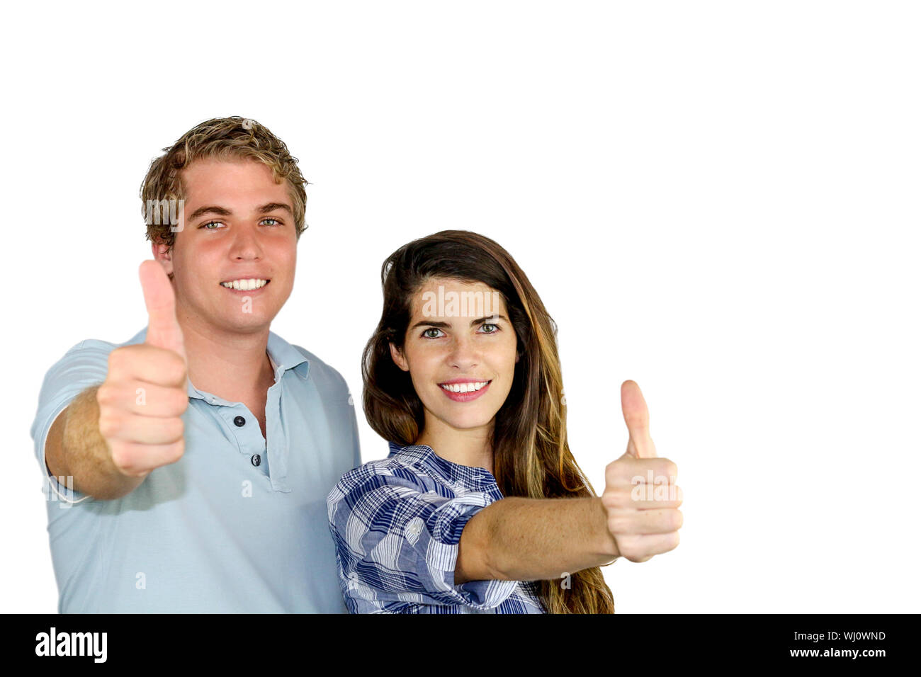 A young man and woman showing victory and positiveness with their ...