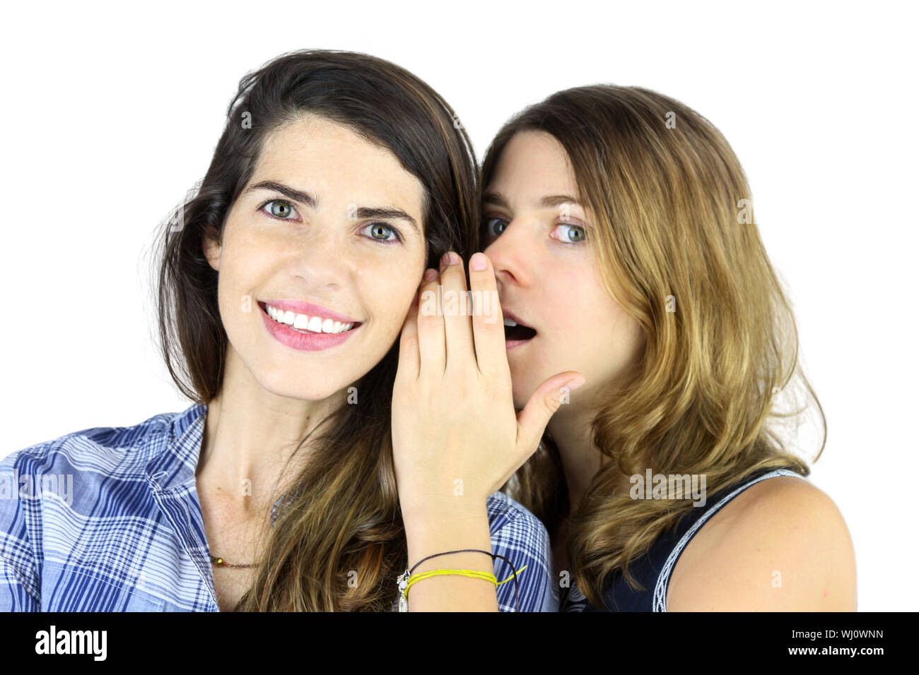 A couple of beautiful young Women gossiping Stock Photo - Alamy