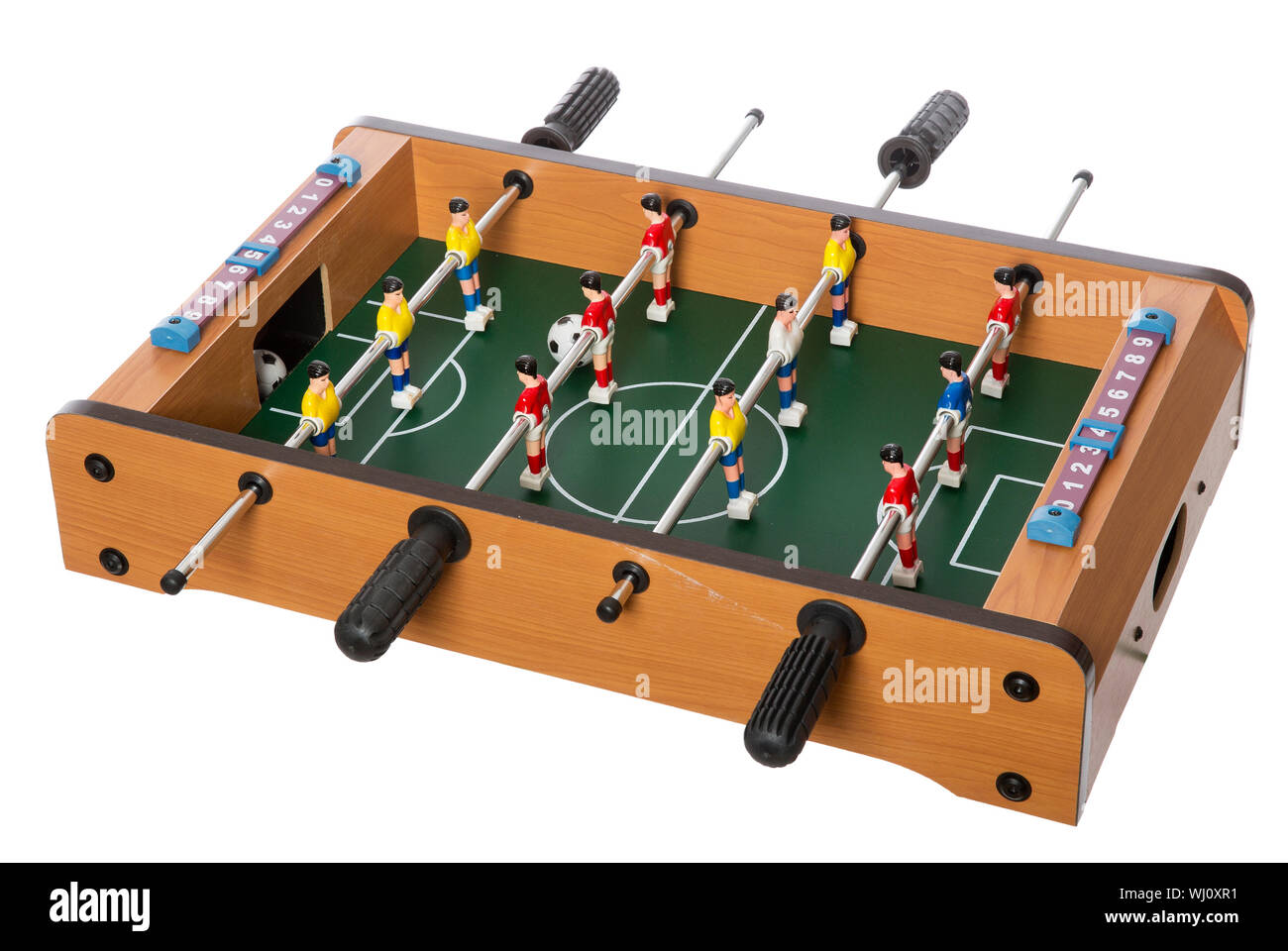 Foosball game isolated on white background Stock Photo - Alamy