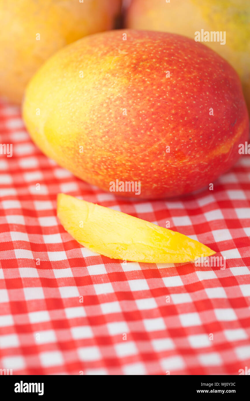 mango fruit on checkered fabric Stock Photo - Alamy
