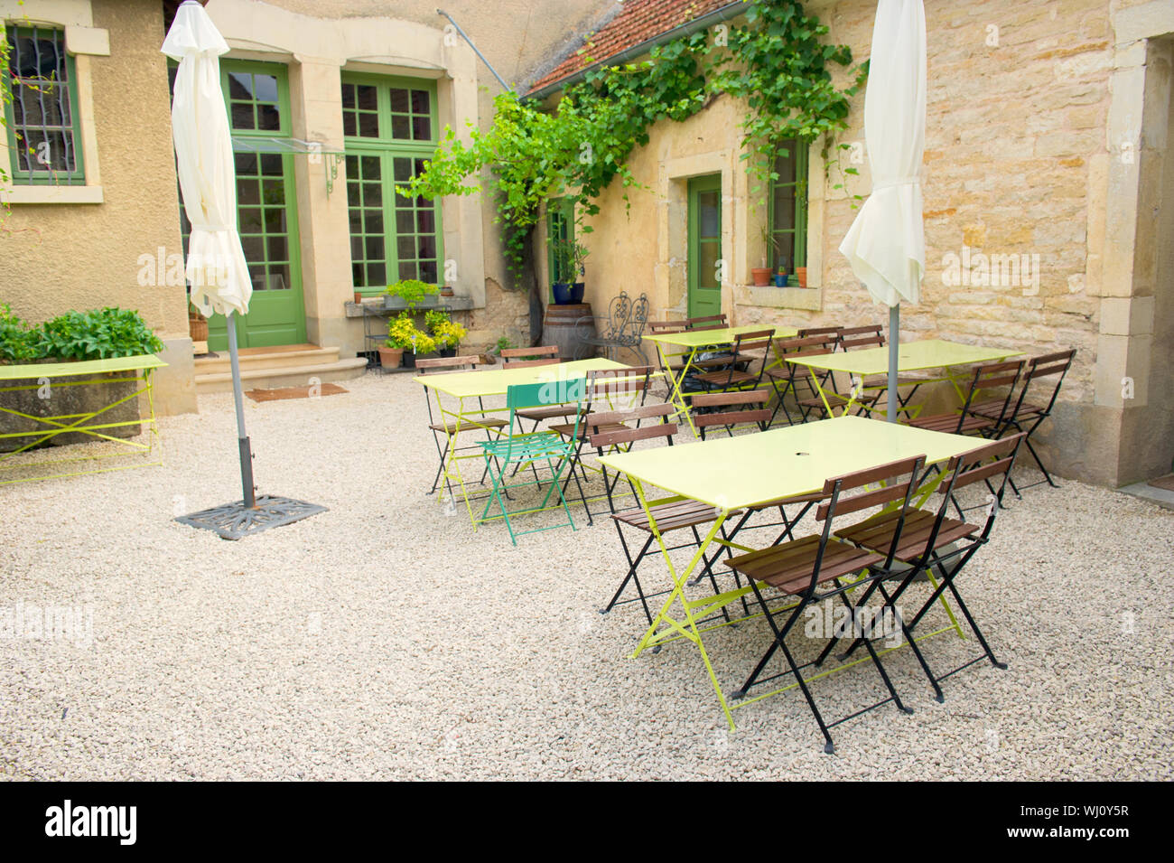 French terrace with green typical furniture Stock Photo - Alamy
