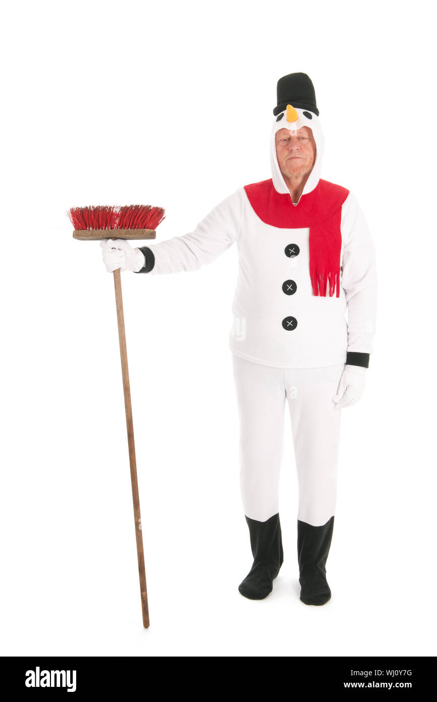 Human snowman is cleaning the street with broom Stock Photo - Alamy