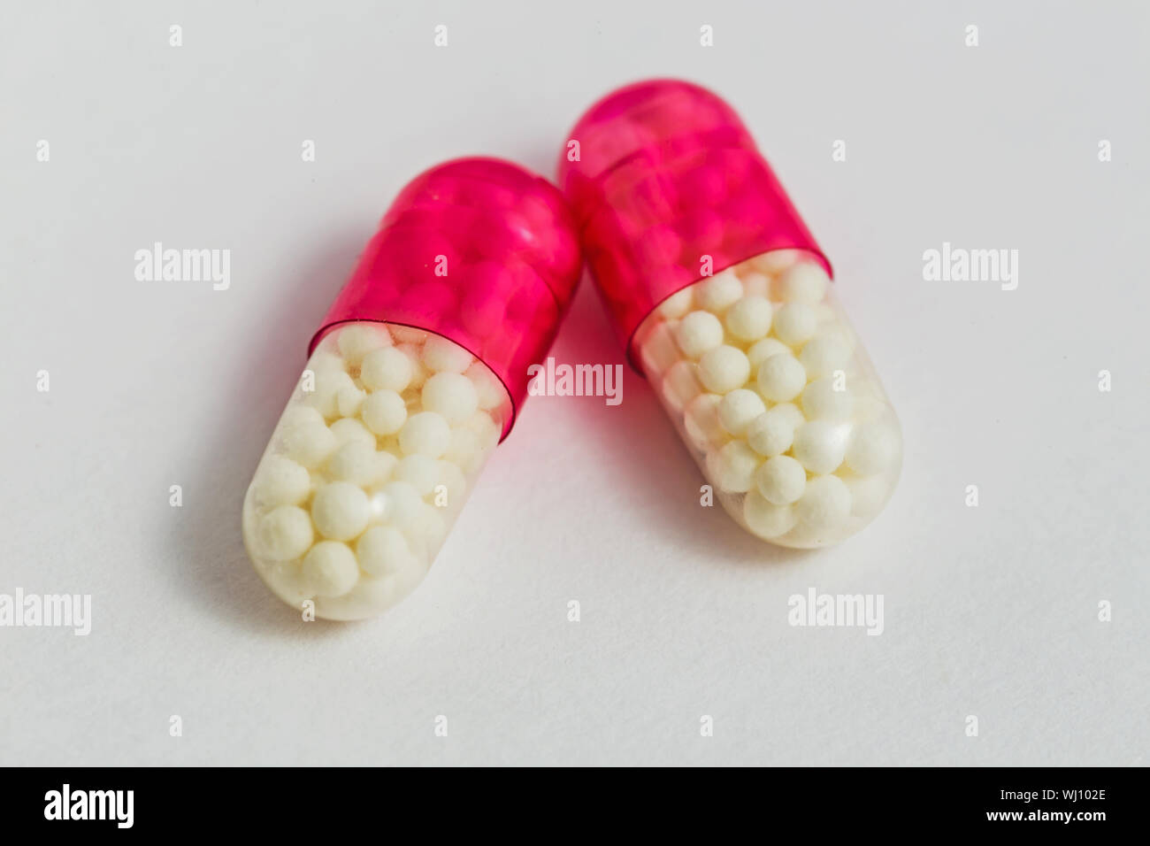 the color pill or just salmon oil capsules Stock Photo - Alamy