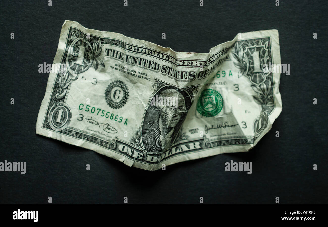 Crumpled dollar bill hi-res stock photography and images - Alamy