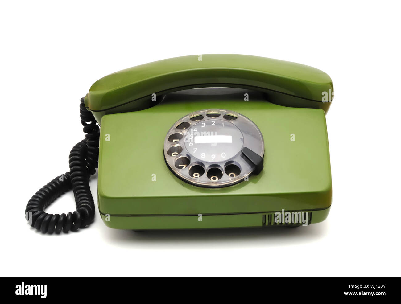 Old analogue disk phone on a white background Stock Photo - Alamy