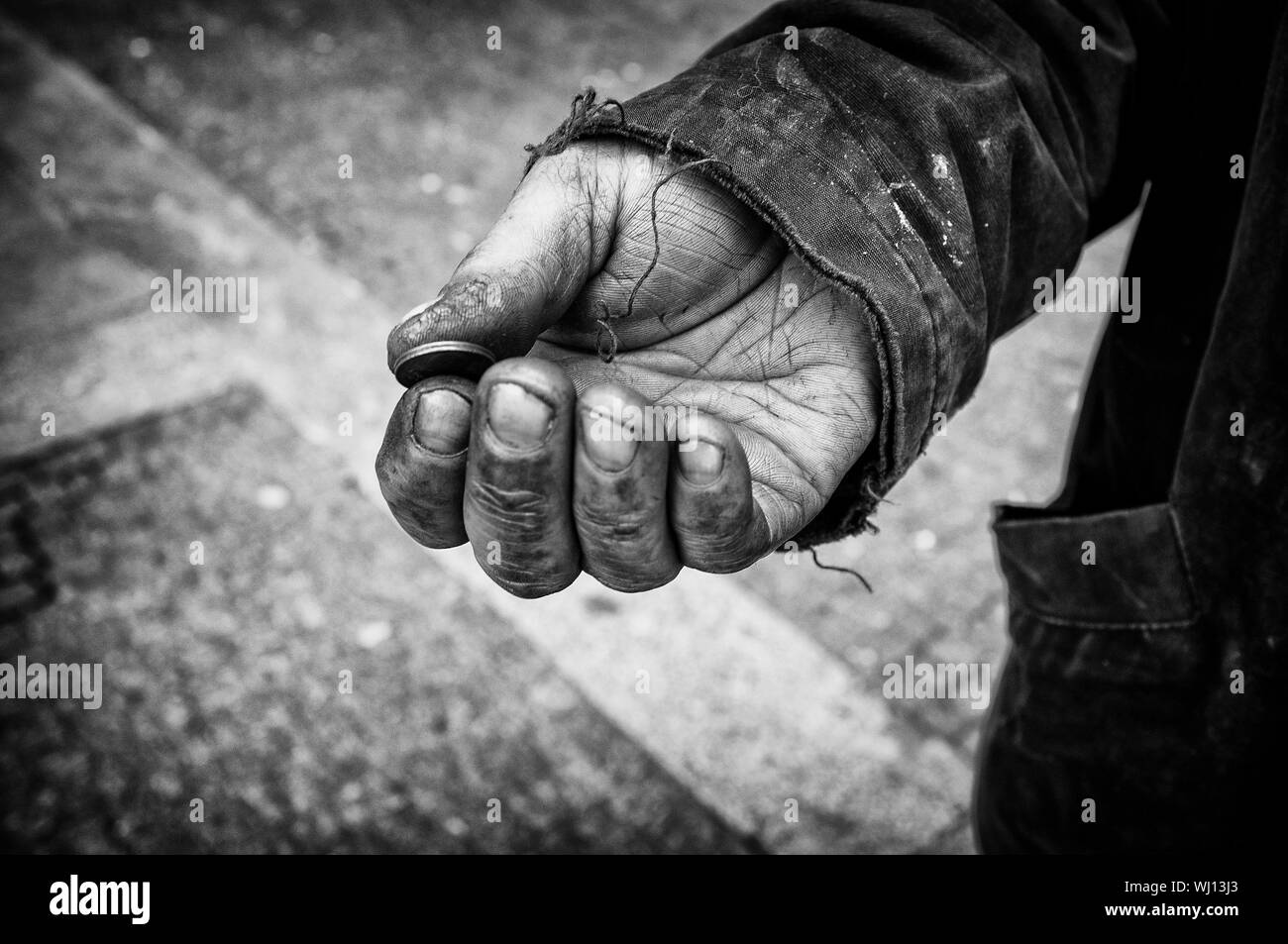 Beggar Hand High Resolution Stock Photography and Images - Alamy