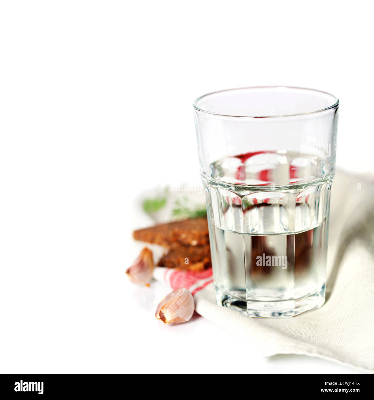 Russian vodka with traditional black bread over white Stock Photo - Alamy