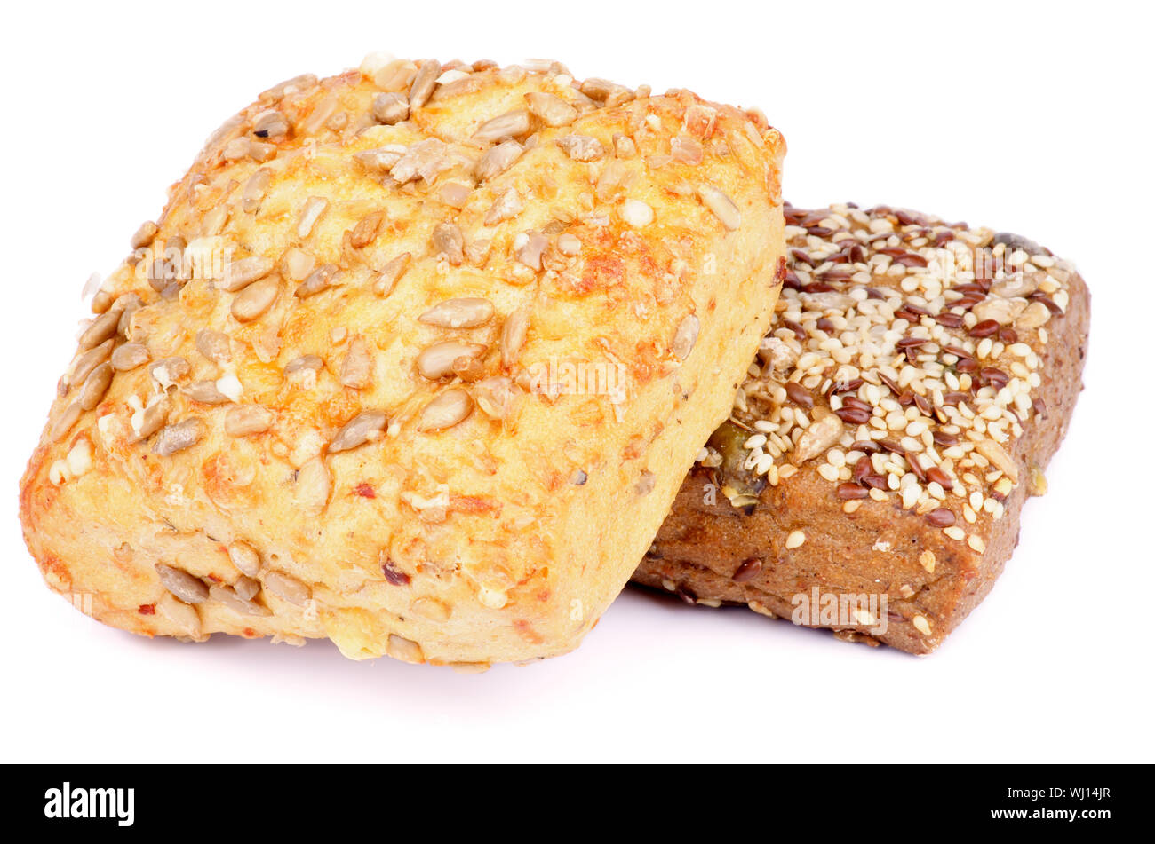 Heap of Sunflower Seeds and Sesame Seeds Buns isolated on white ...