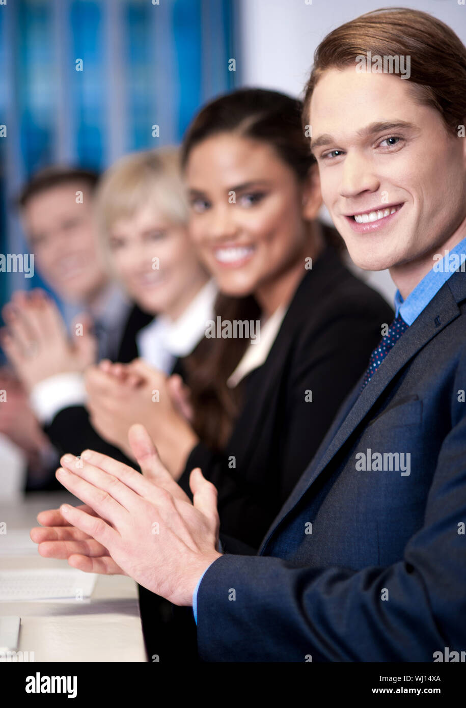 Hands applauding sitting table hi-res stock photography and images - Alamy