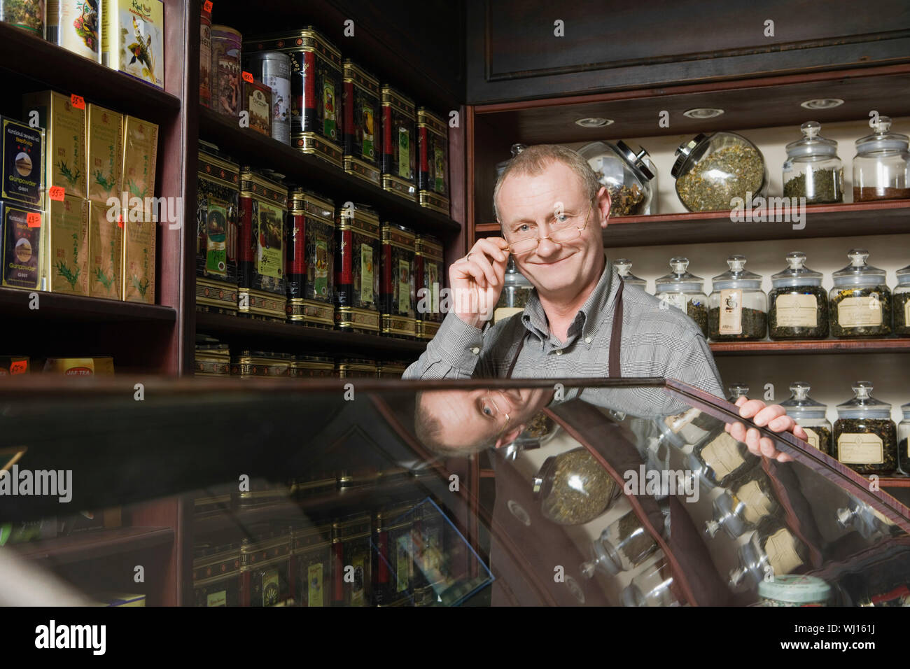 Portrait of confident male owner in tea shop Stock Photo - Alamy