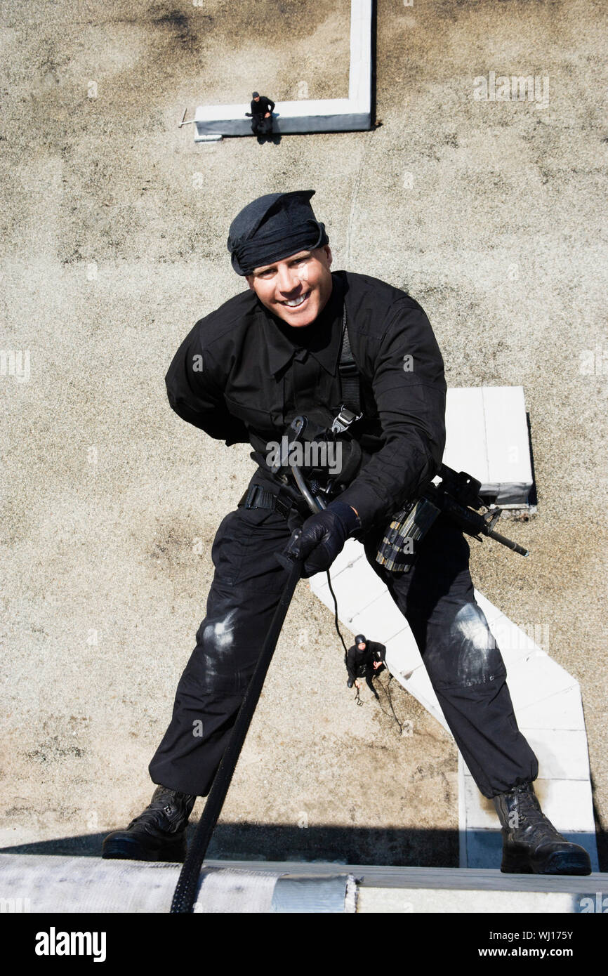 Holding standing army soldier looking down hi-res stock photography and ...