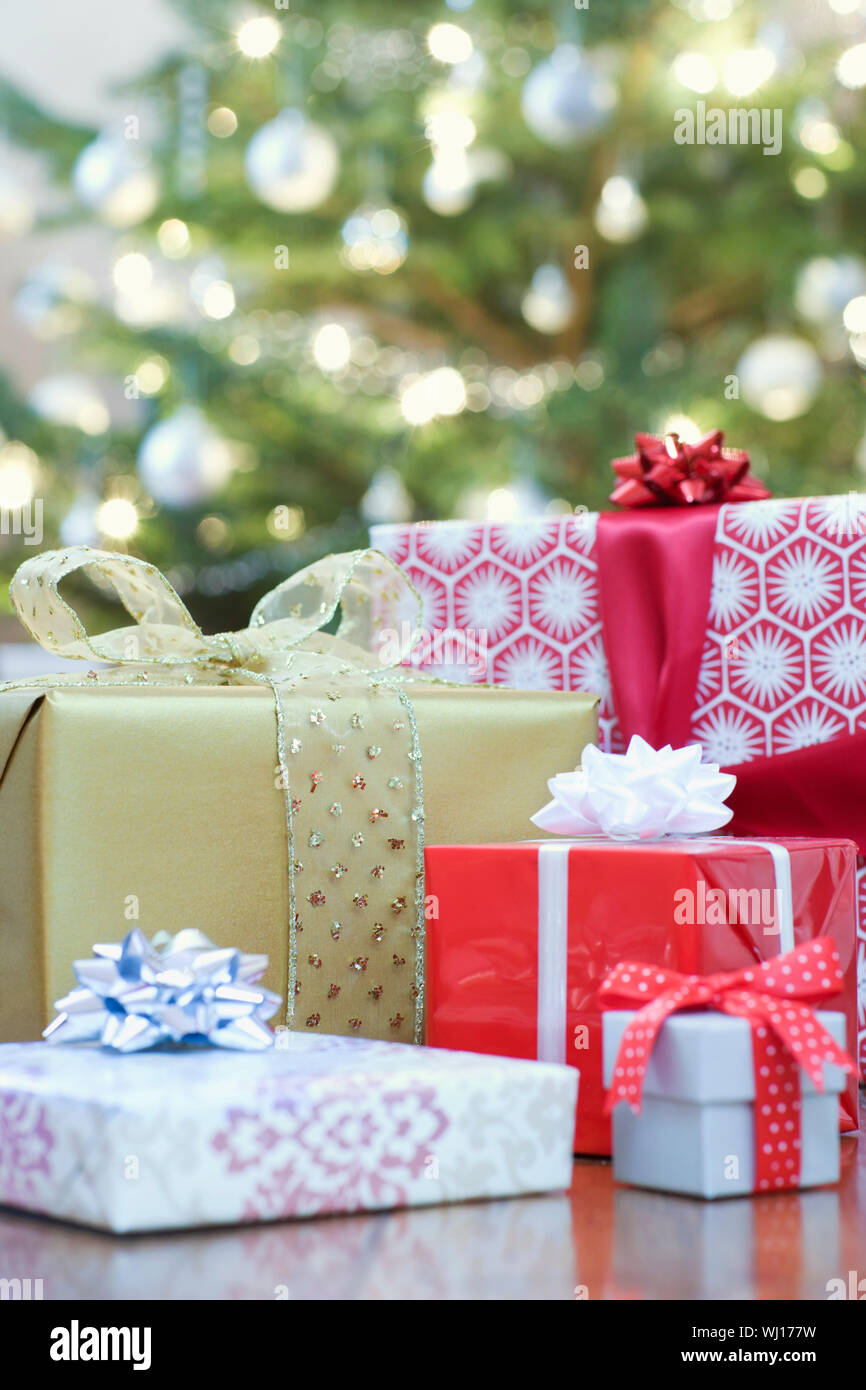 Christmas presents on floor Stock Photo - Alamy