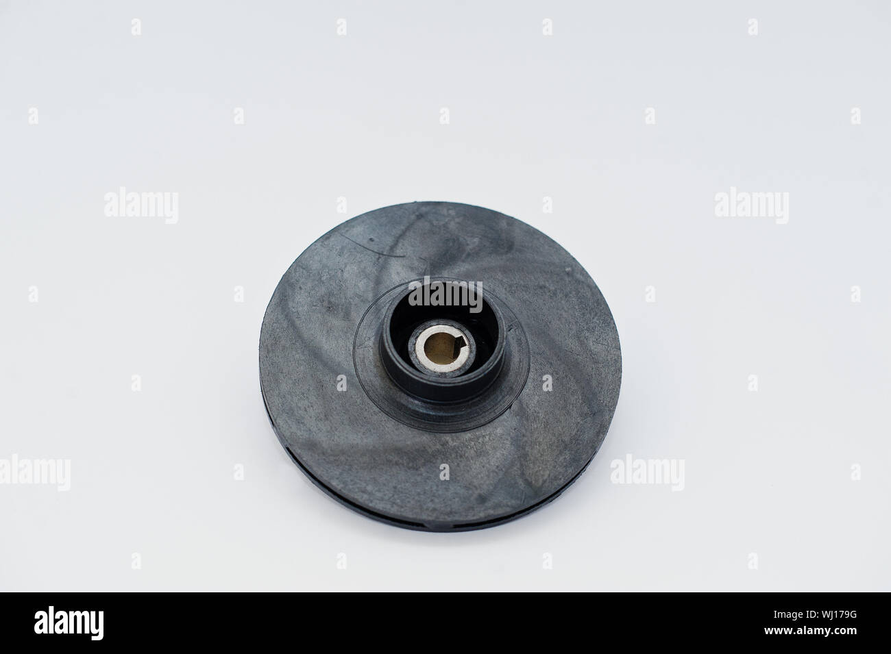 Spare part round disc for water pump isolated on white Stock Photo - Alamy