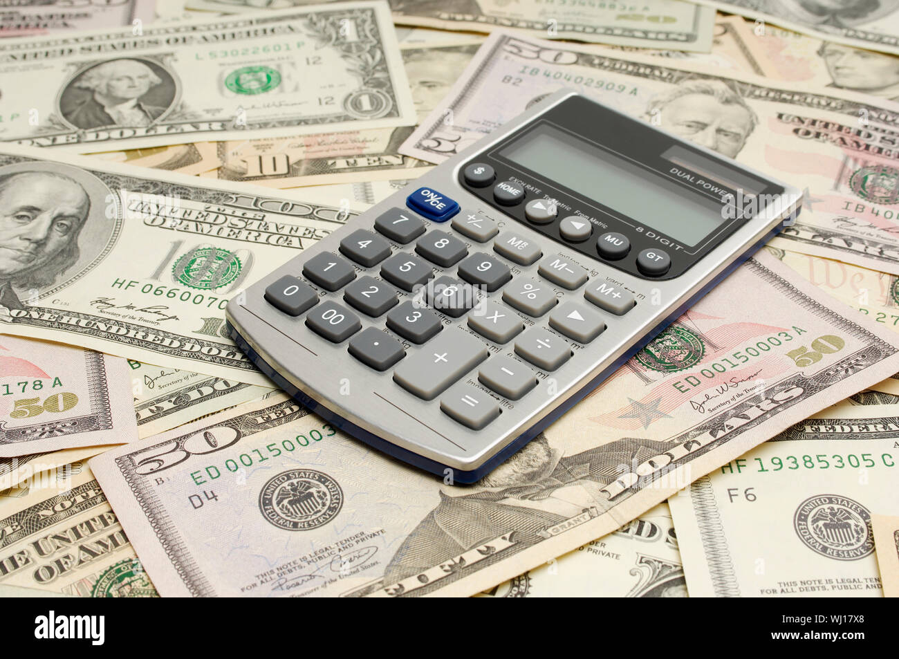 Money and Calculator Stock Photo - Alamy