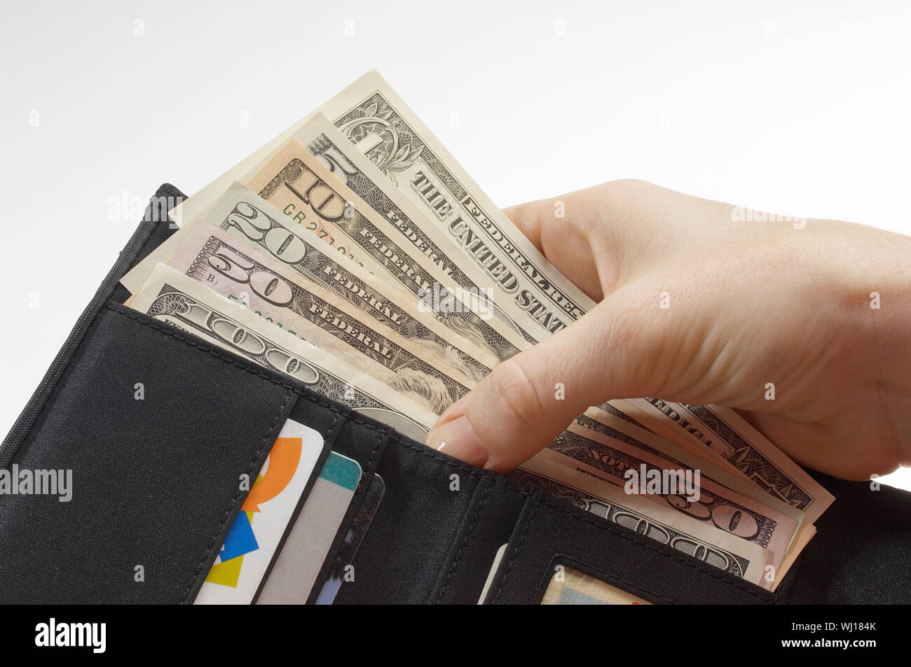 Wallet Full of Money Stock Photo - Alamy
