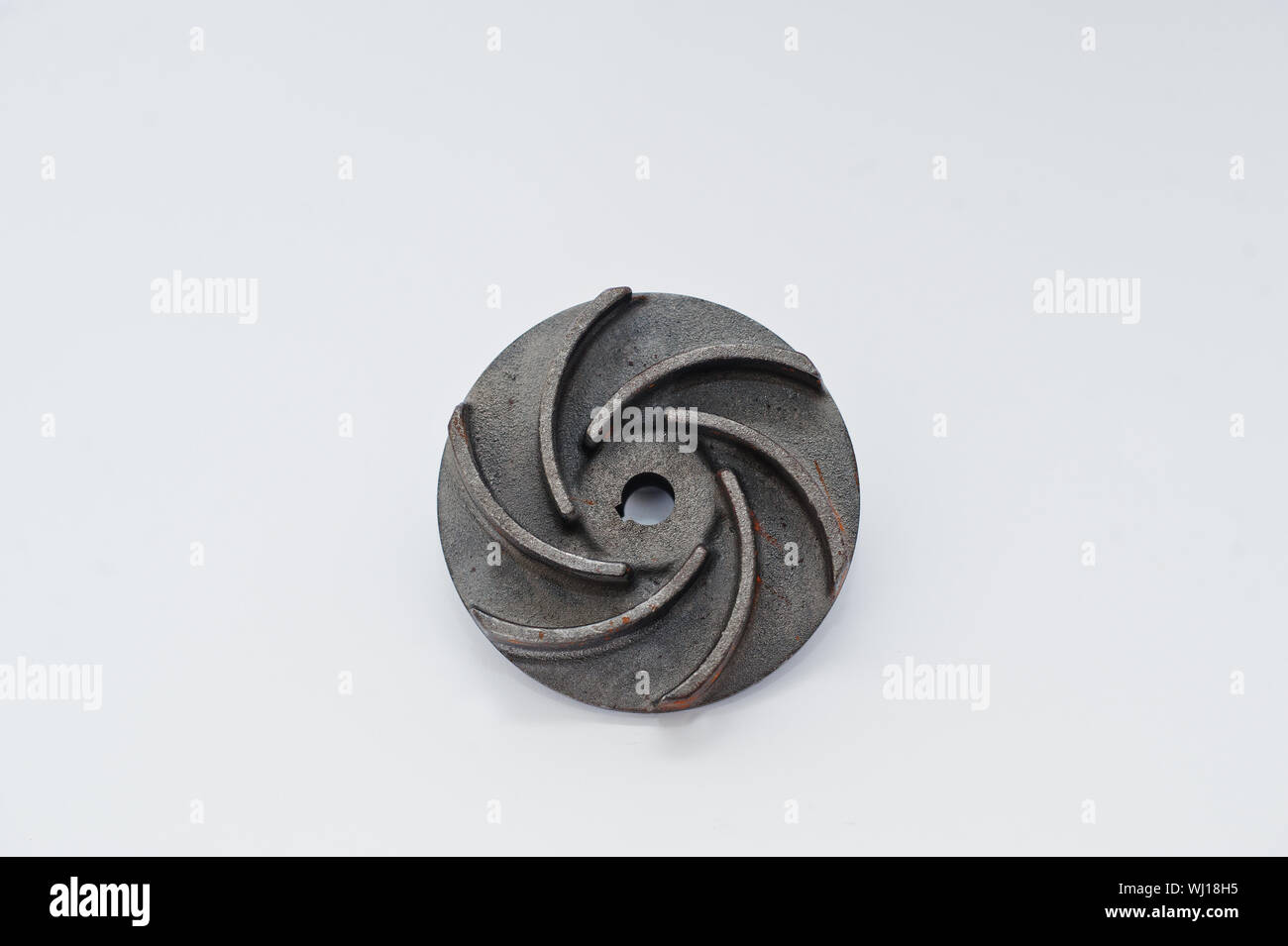 Spare part round disc for water pump isolated on white Stock Photo - Alamy