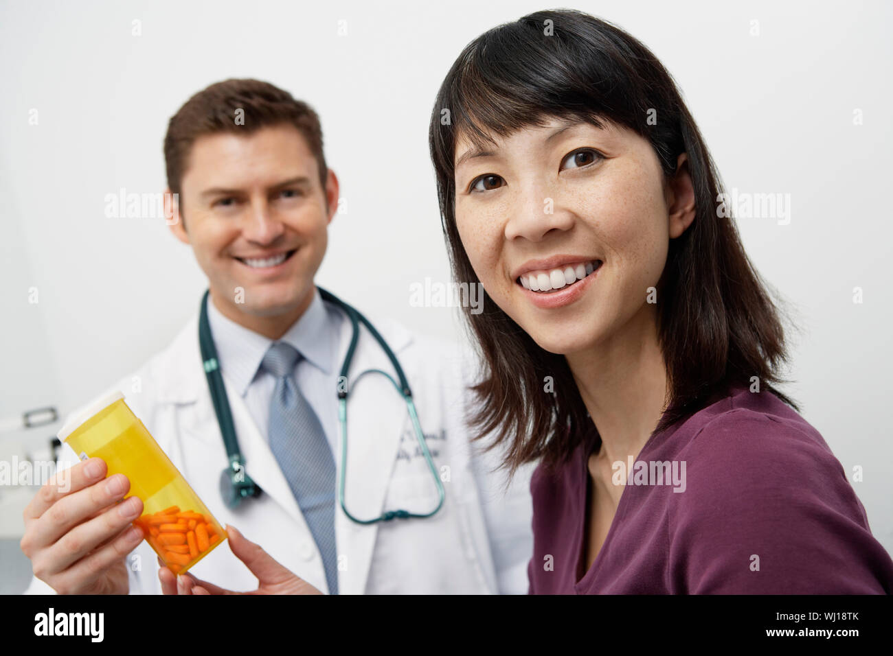 Doctor giving female patient medication in hospital Stock Photo - Alamy