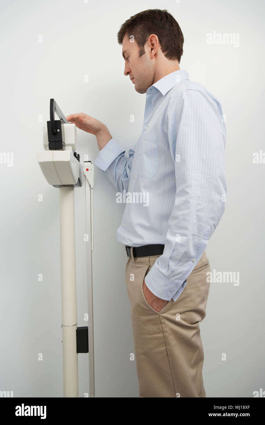Man scales 40 hi-res stock photography and images - Alamy