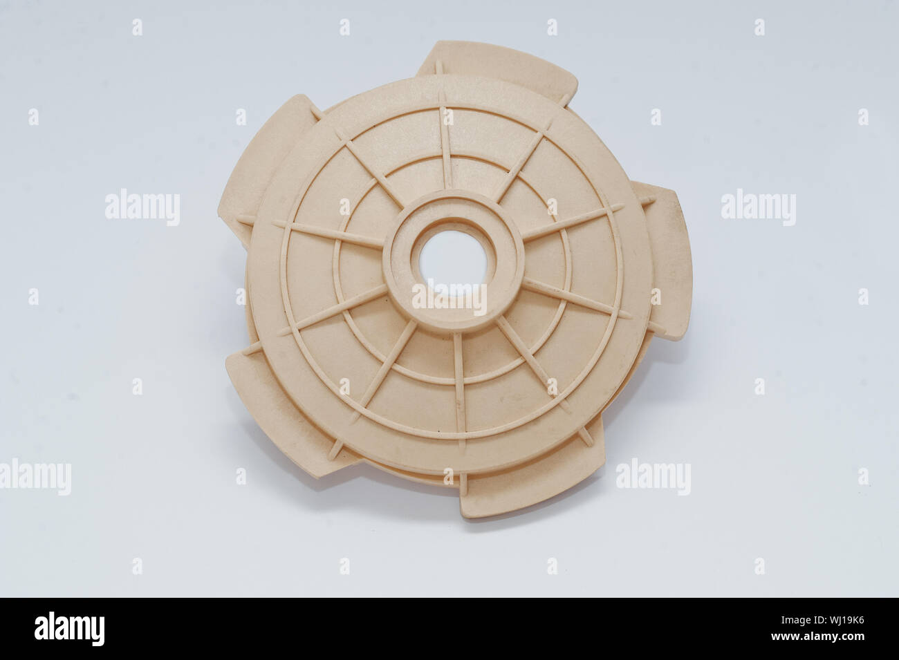 Spare part round disc for water pump isolated on white Stock Photo - Alamy